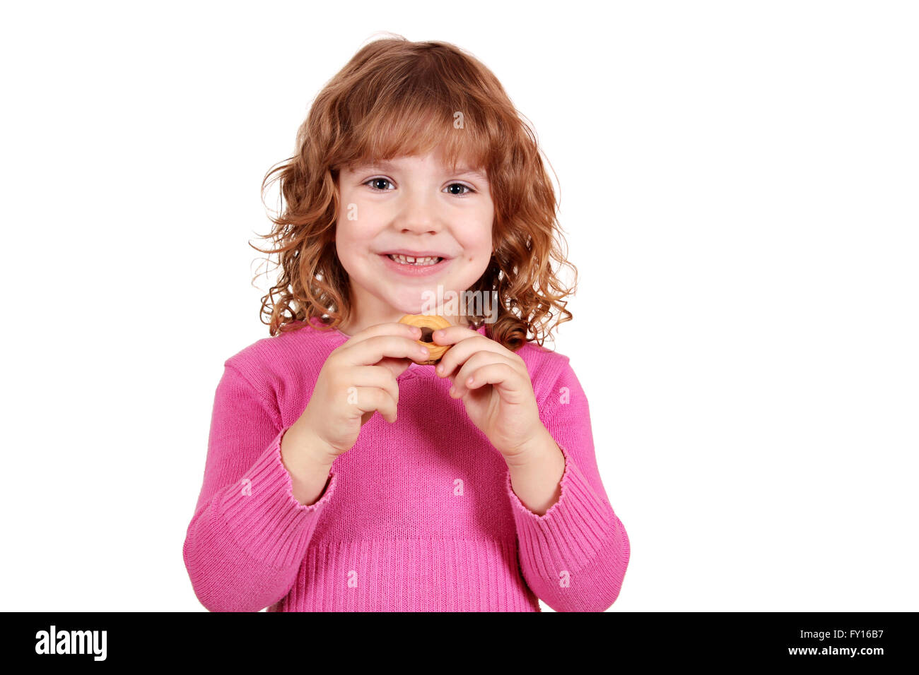 cute little girl eat cookie Stock Photo - Alamy