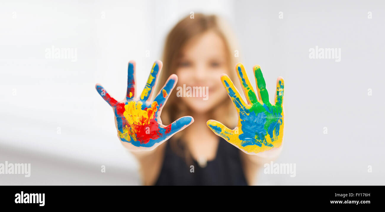 girl showing painted hands Stock Photo - Alamy
