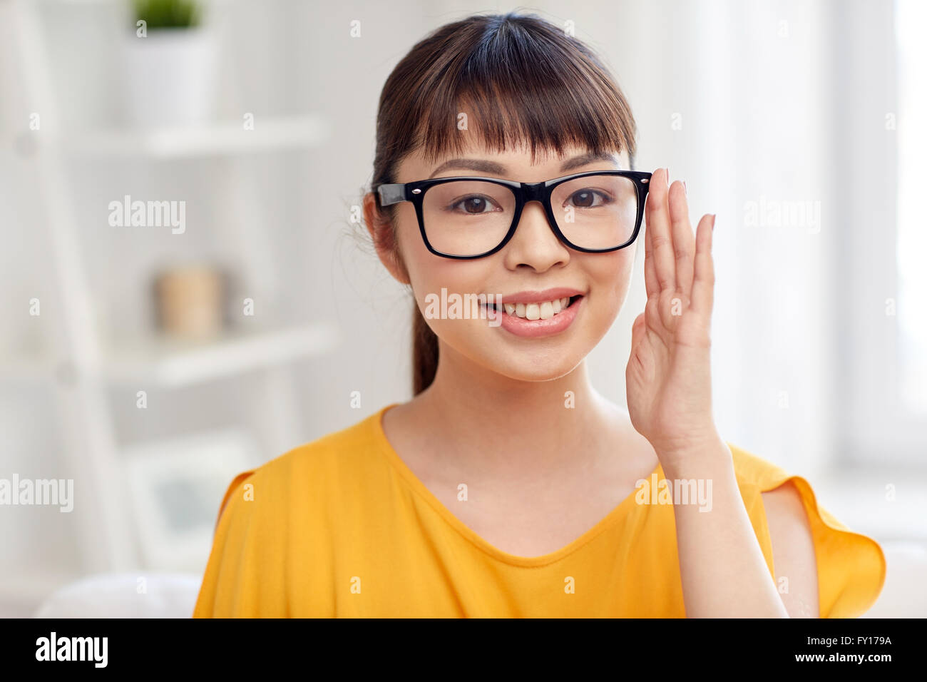 happy asian young woman in glasses at home Stock Photo - Alamy
