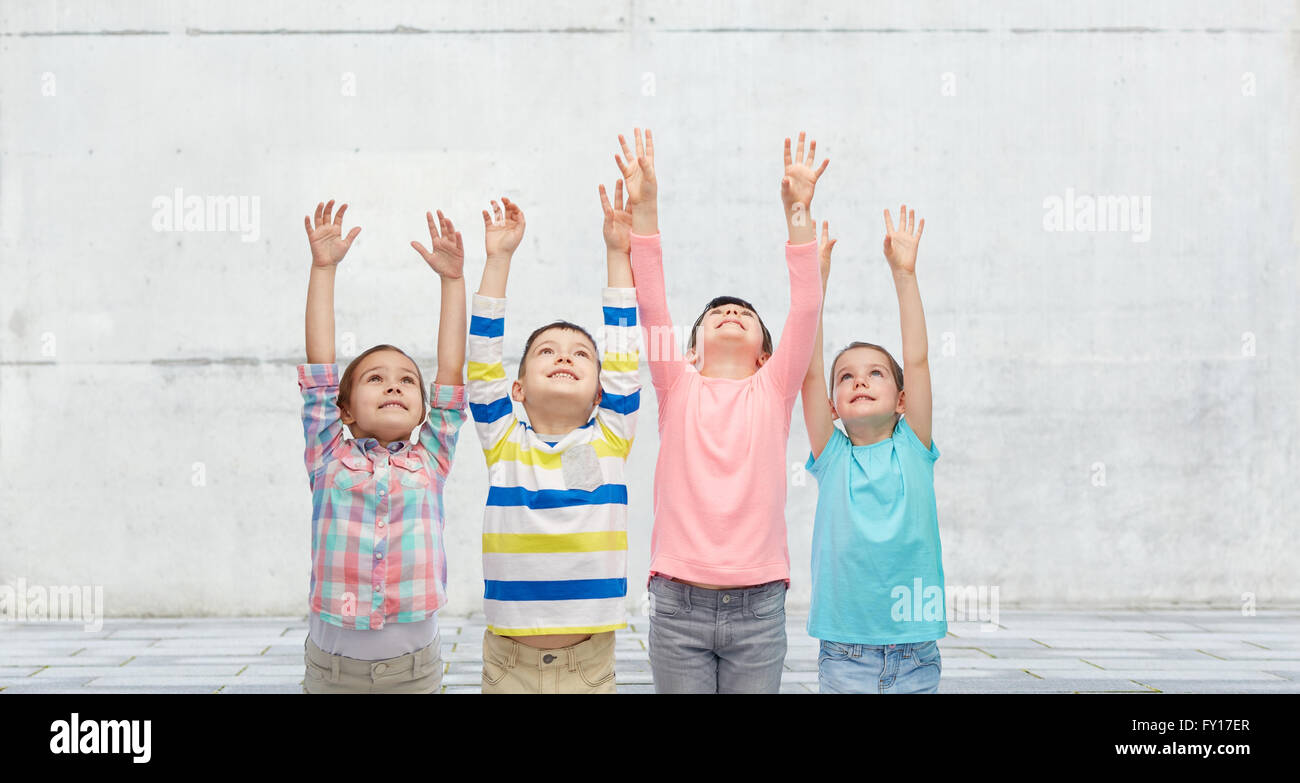 happy children celebrating victory on street Stock Photo - Alamy