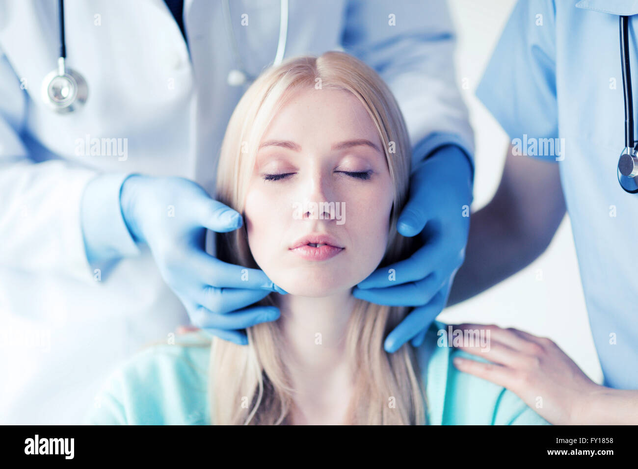 Plastic surgeon doctor patient hi-res stock photography and images - Alamy