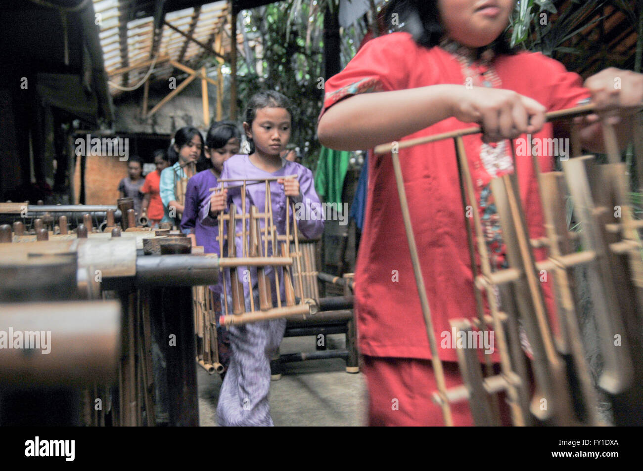 A group of children prepare to perform Angklung in Saung Udjo. This ...