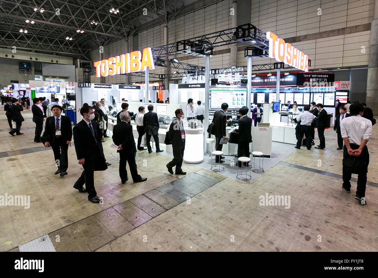 Visitors gather at the Techno-Frontier 2016 exhibition at Makuhari ...