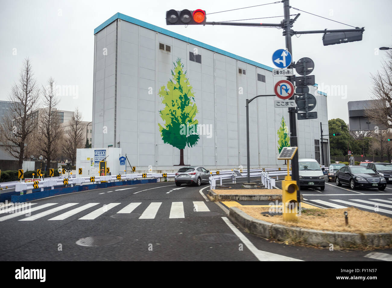 Trees on the building wall in Tokyo city, Japan Stock Photo - Alamy