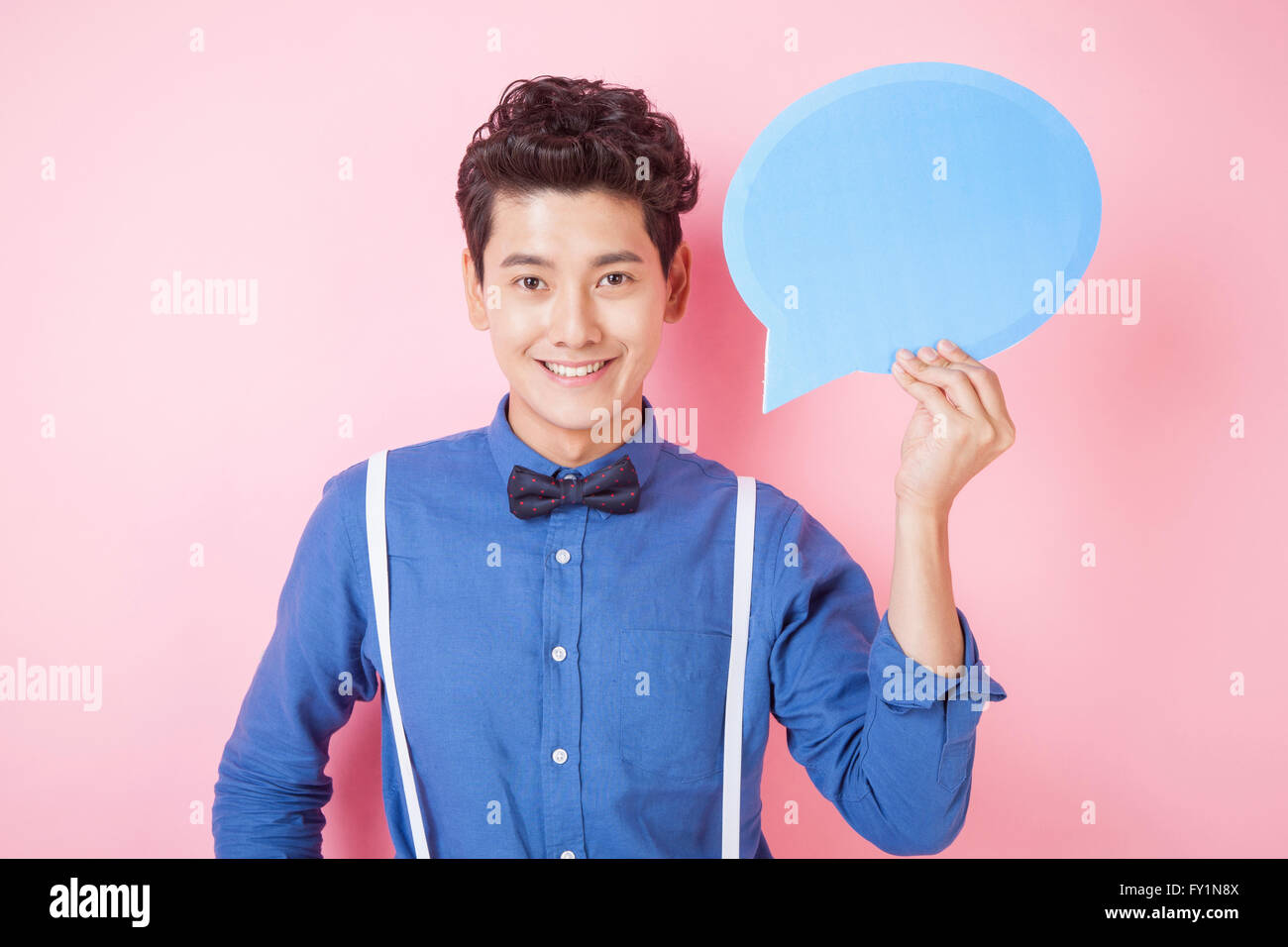 Portrait of young smiling man in retro style with a speech balloon ...