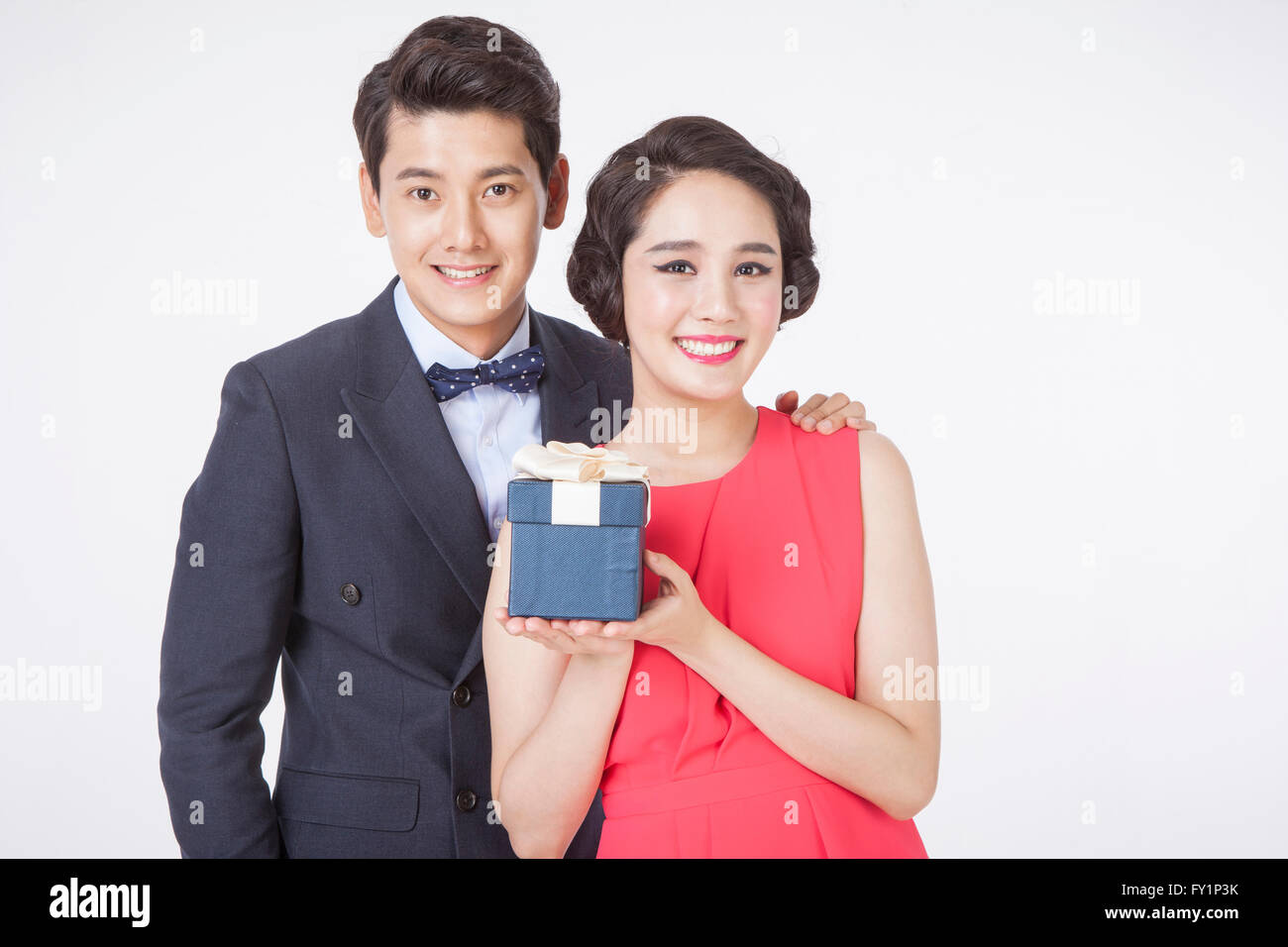 Couple looking into gift box hi-res stock photography and images - Alamy