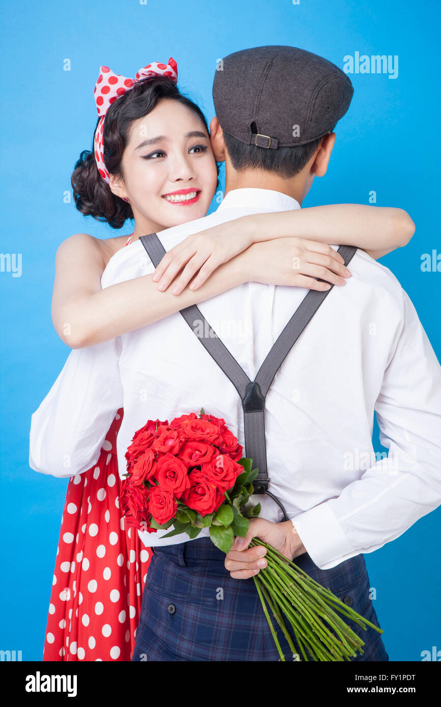 Red roses hugging in two hi-res stock photography and images - Alamy