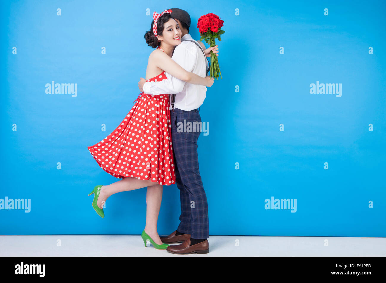 Red Roses Hugging In Two High Resolution Stock Photography and Images ...