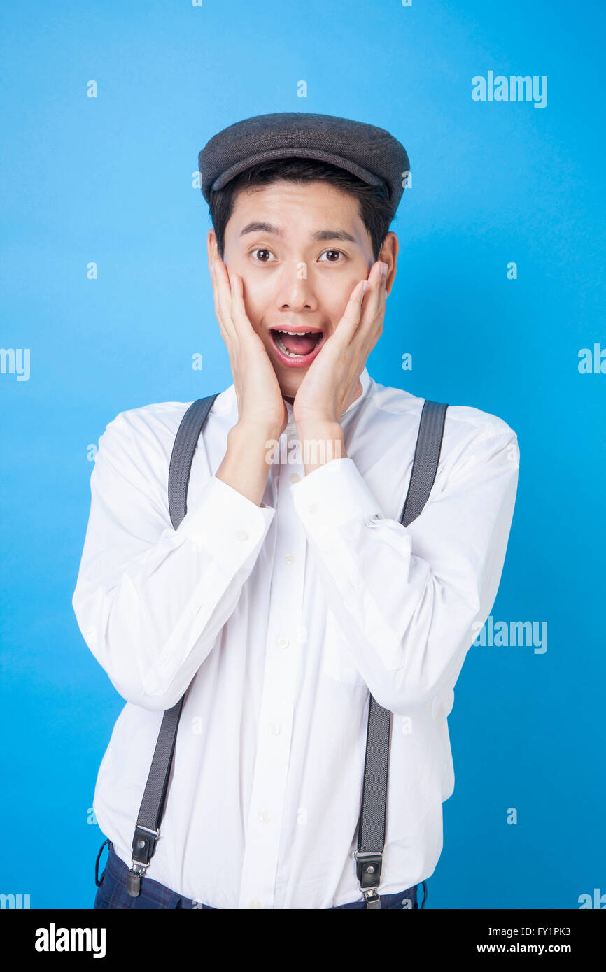Portrait of young man in retro style with a surprised face Stock Photo ...