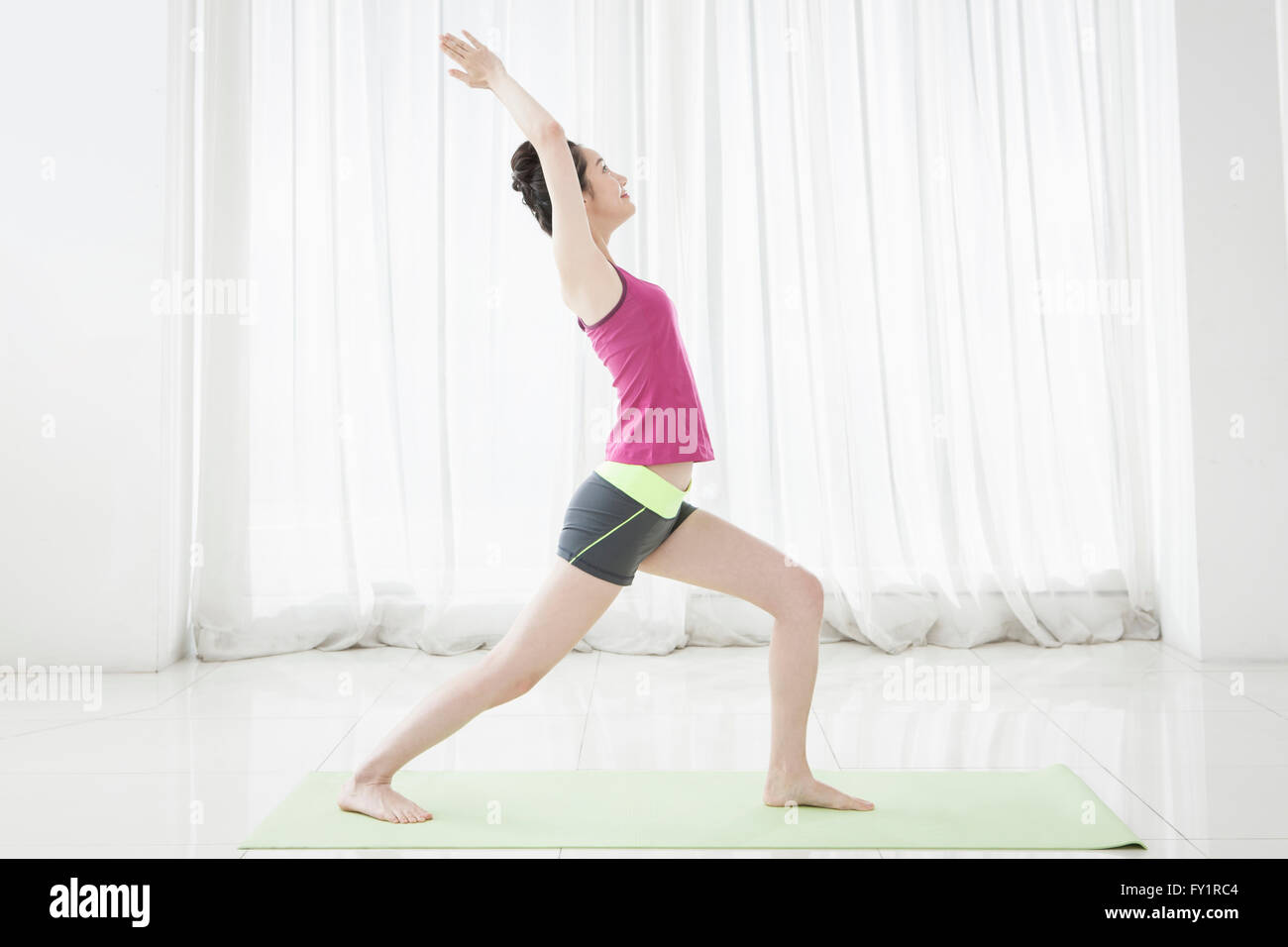 Young slim woman yoga hi-res stock photography and images - Alamy