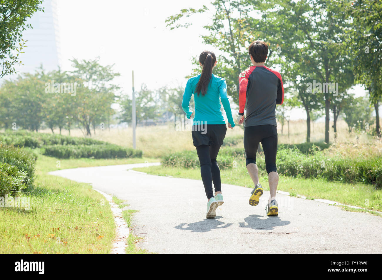 Couple jogging forest hi-res stock photography and images - Alamy