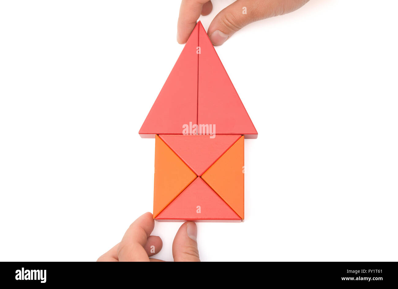 hands making up a house on white with clipping path Stock Photo - Alamy