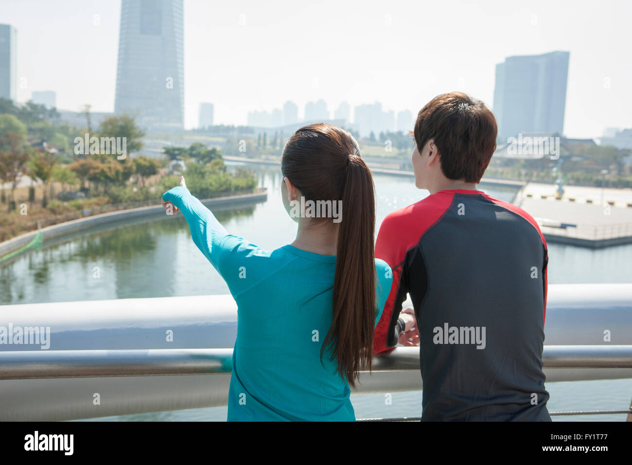 Back view young people hi-res stock photography and images - Alamy