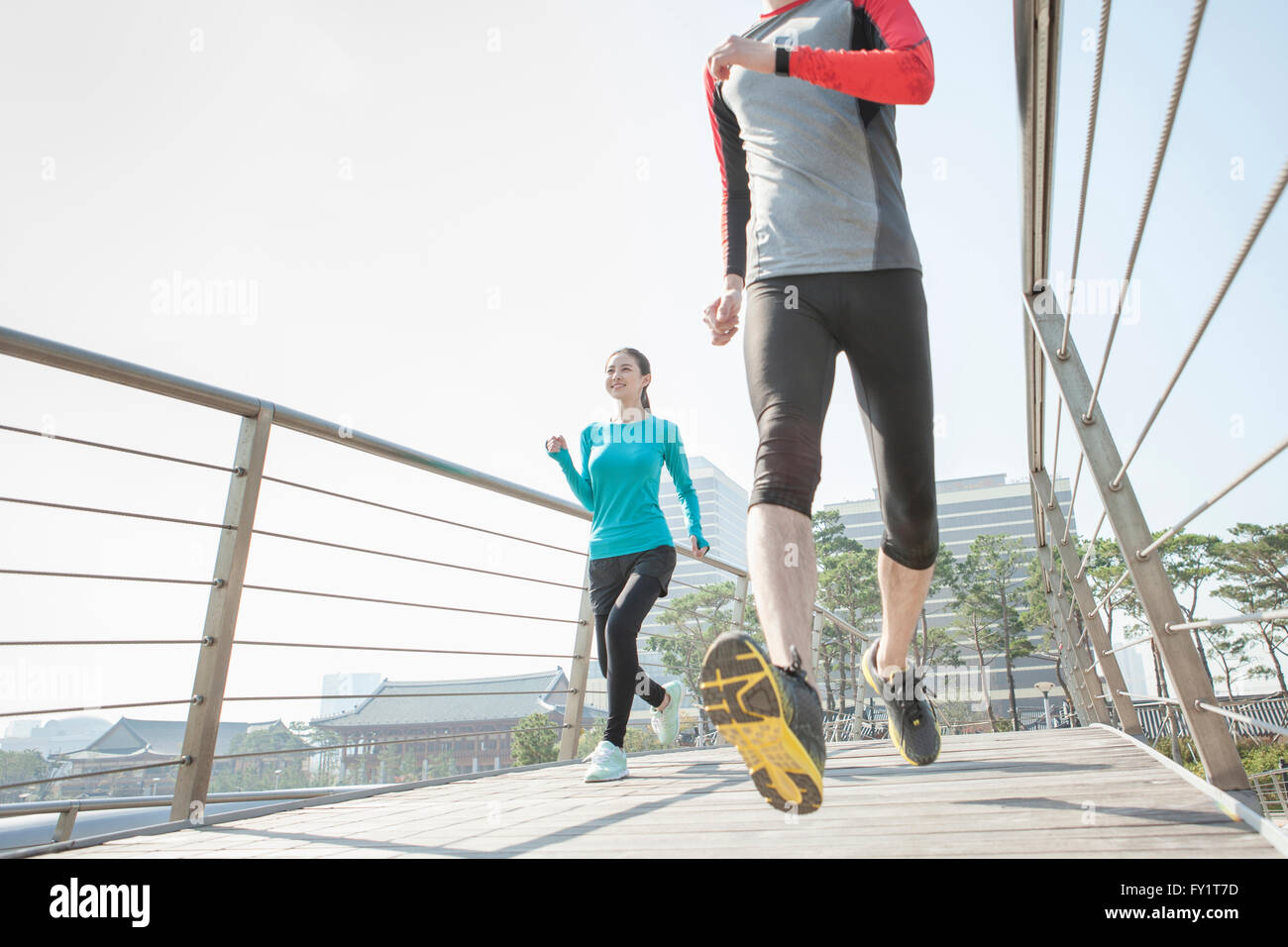 Female young running park hi-res stock photography and images - Alamy