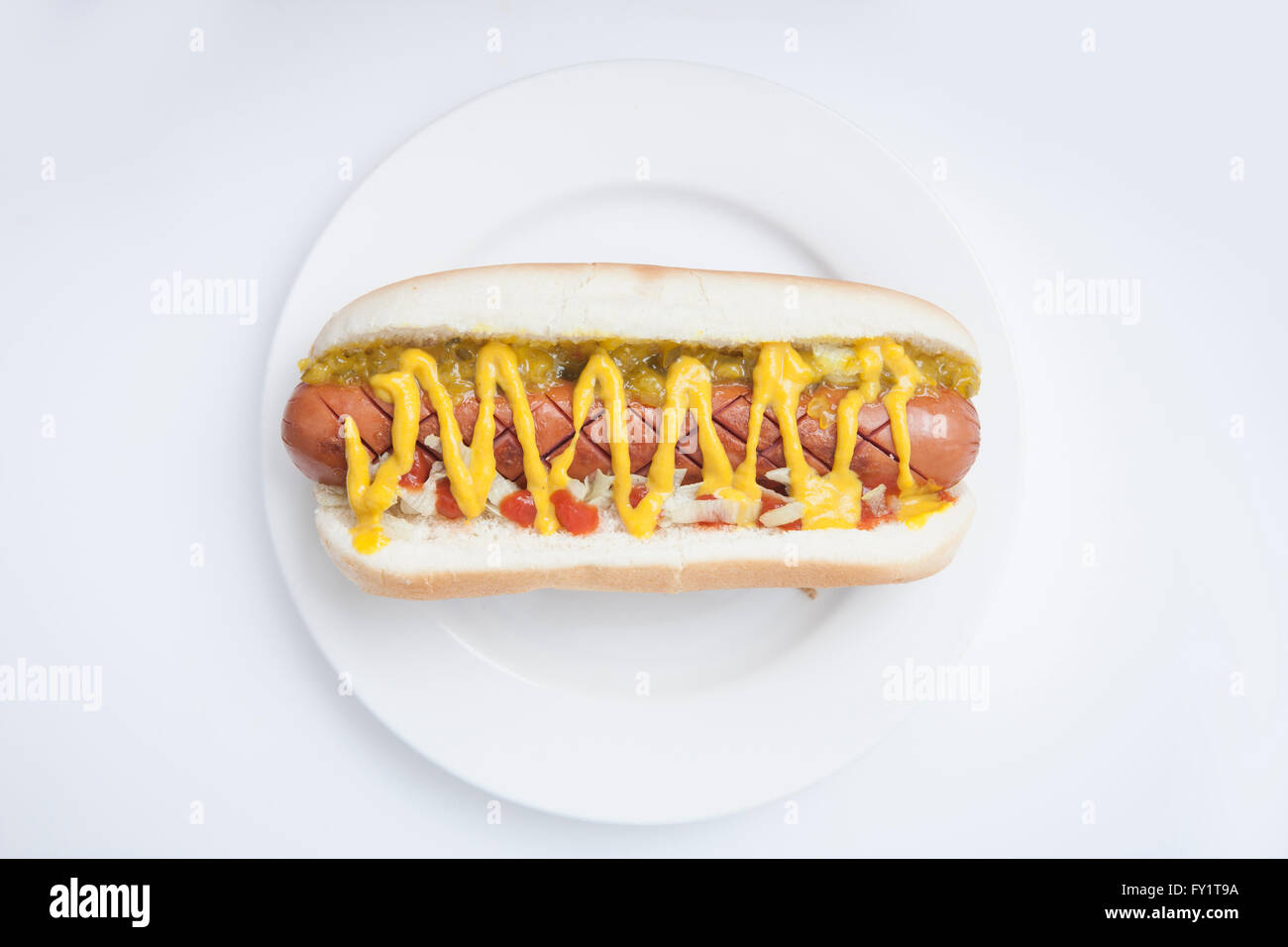 One hot dog on plate Stock Photo - Alamy