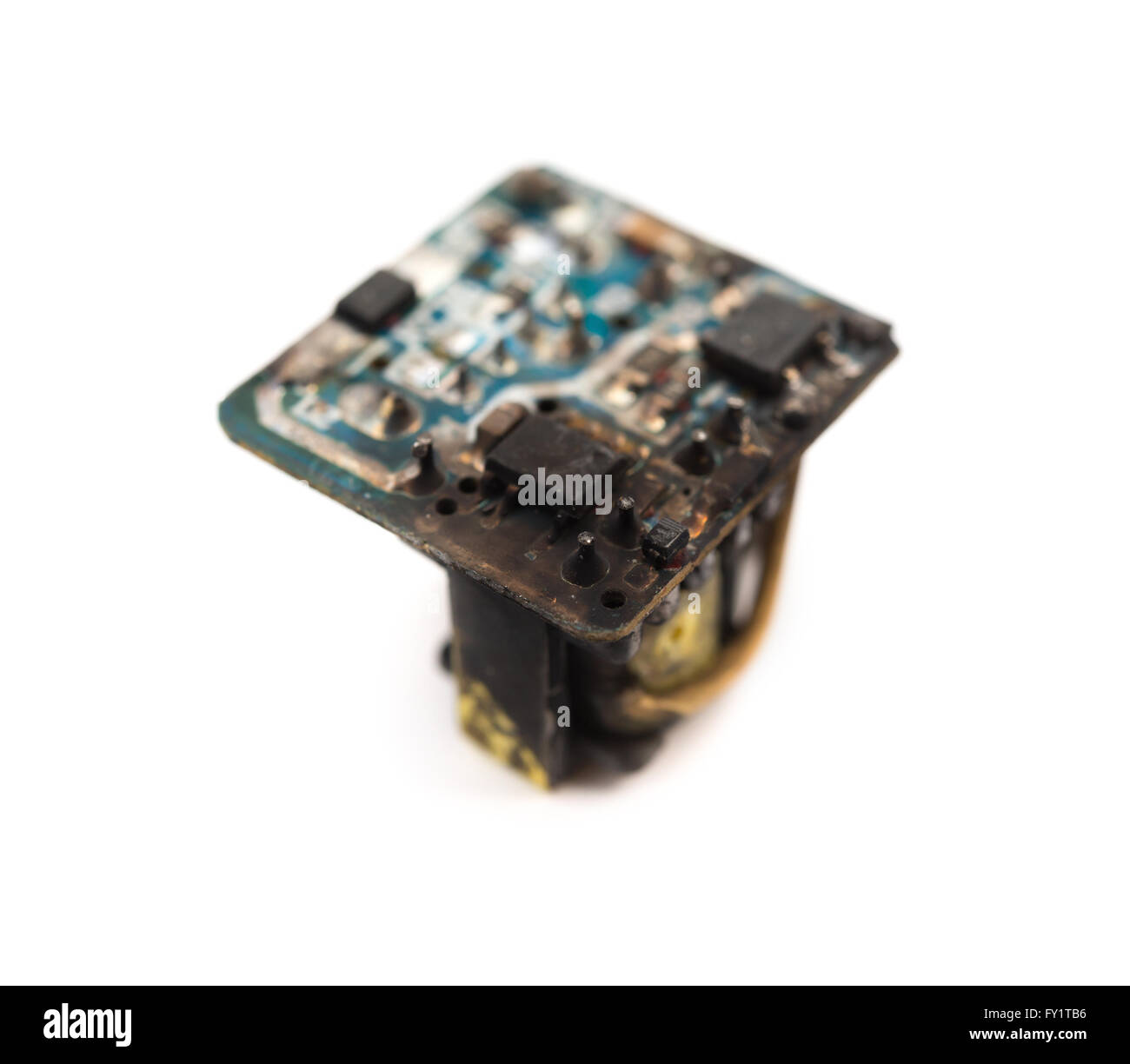 burnt out core of a mobile recharger on white background Stock Photo ...
