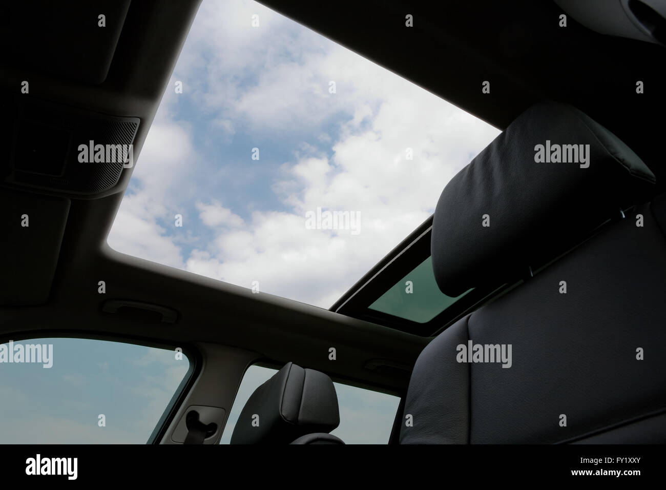 The open hatch on a roof of the modern car Stock Photo - Alamy
