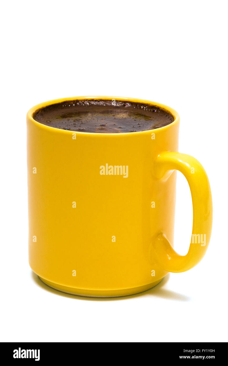 Yellow mug from coffee on a white background Stock Photo - Alamy