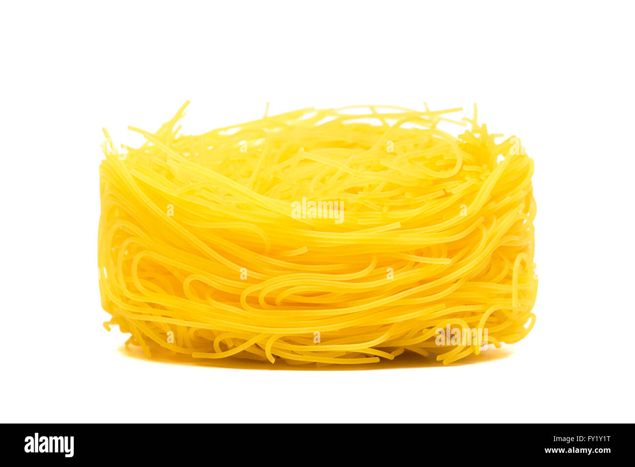 yellow beautiful pasta on a white background Stock Photo - Alamy