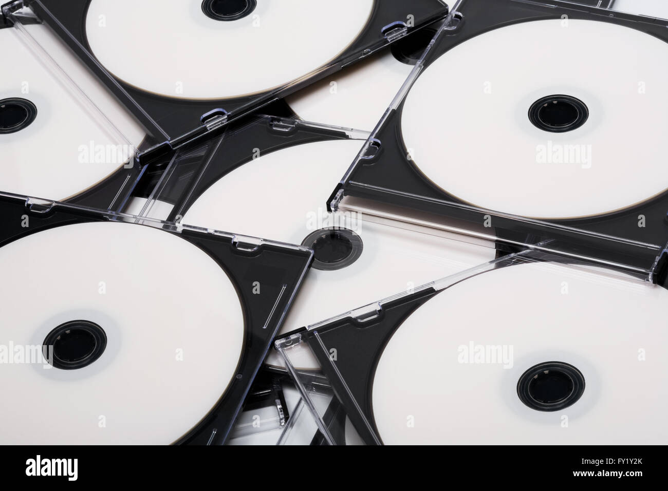 Disks cd in boxes as a background Stock Photo - Alamy