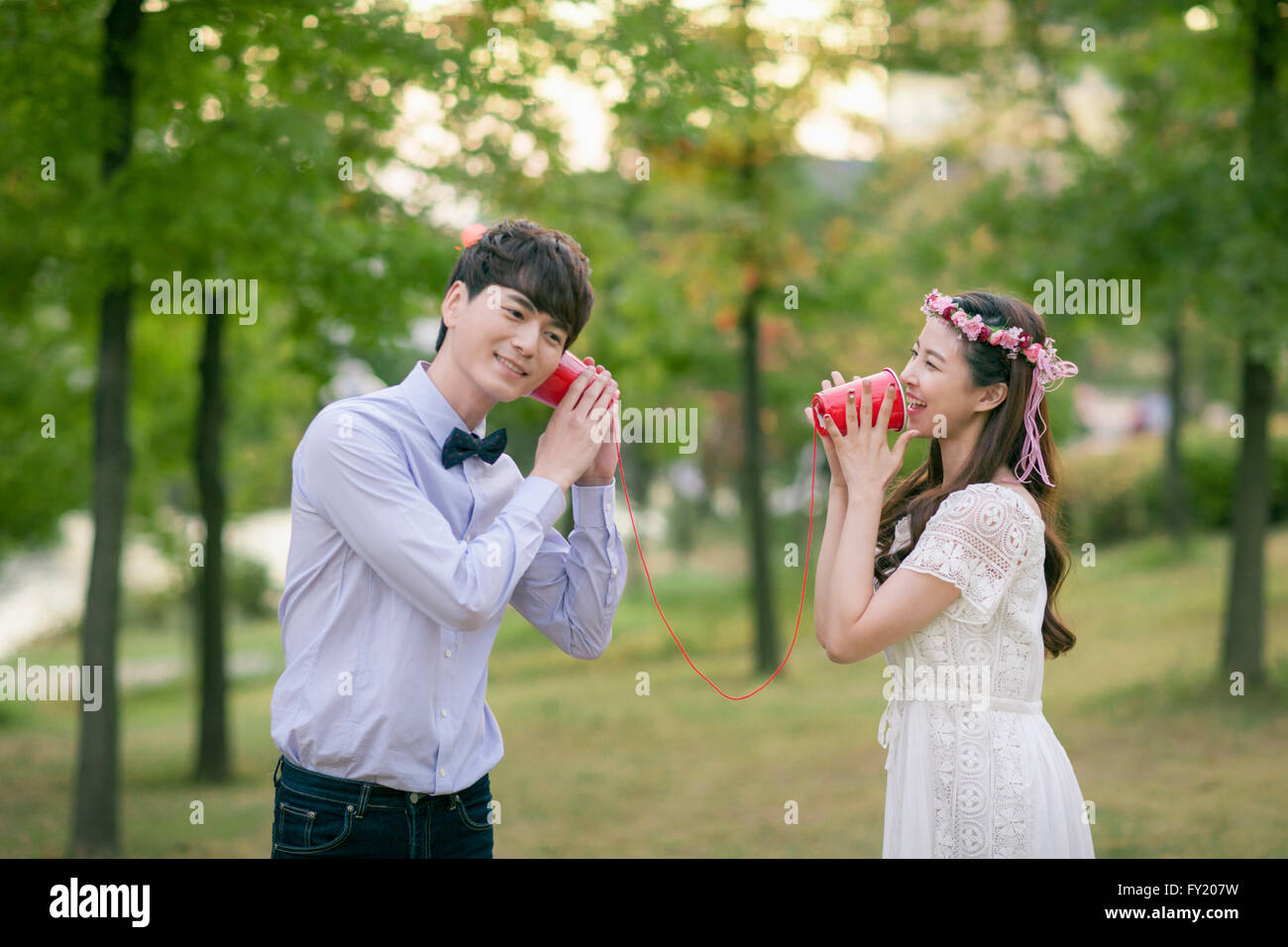 Couple talking tin can hi-res stock photography and images - Alamy