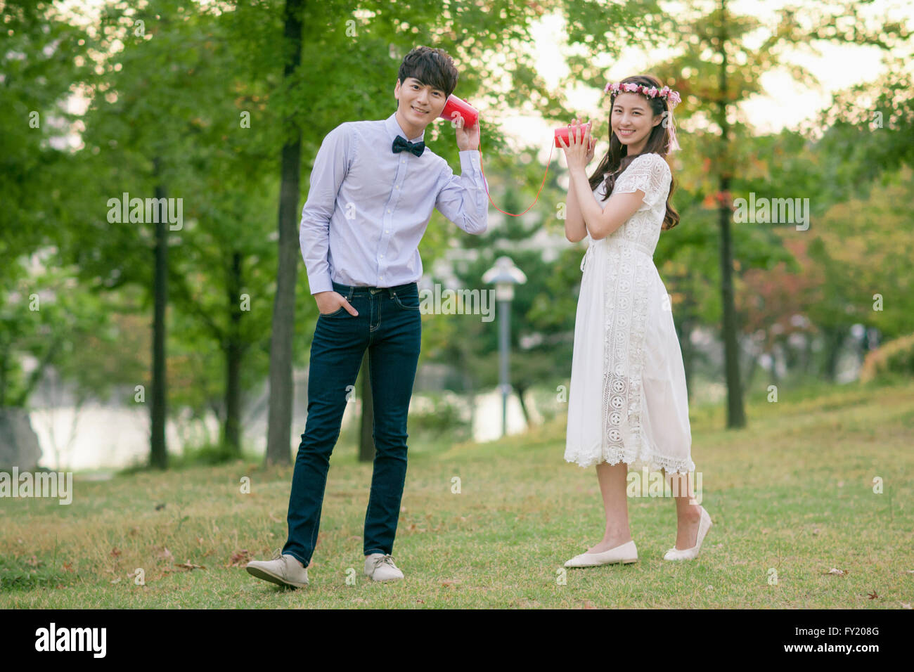 Couple talking tin can hi-res stock photography and images - Alamy