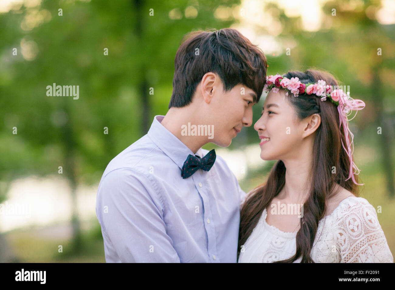 Facing happy hi-res stock photography and images - Alamy