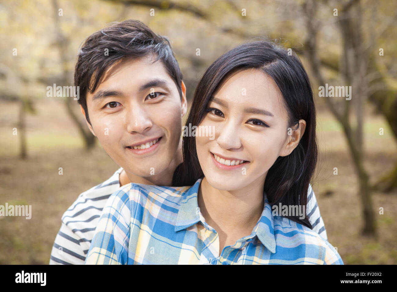Couple smiling together Stock Photo - Alamy