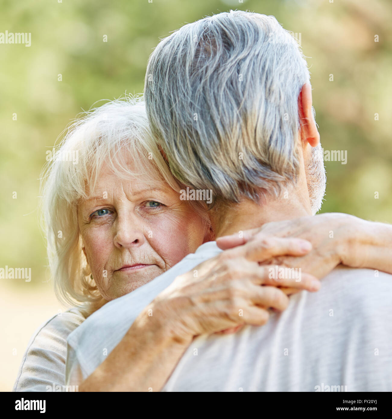 Seniors hugging each other in the nature in summer Stock Photo - Alamy