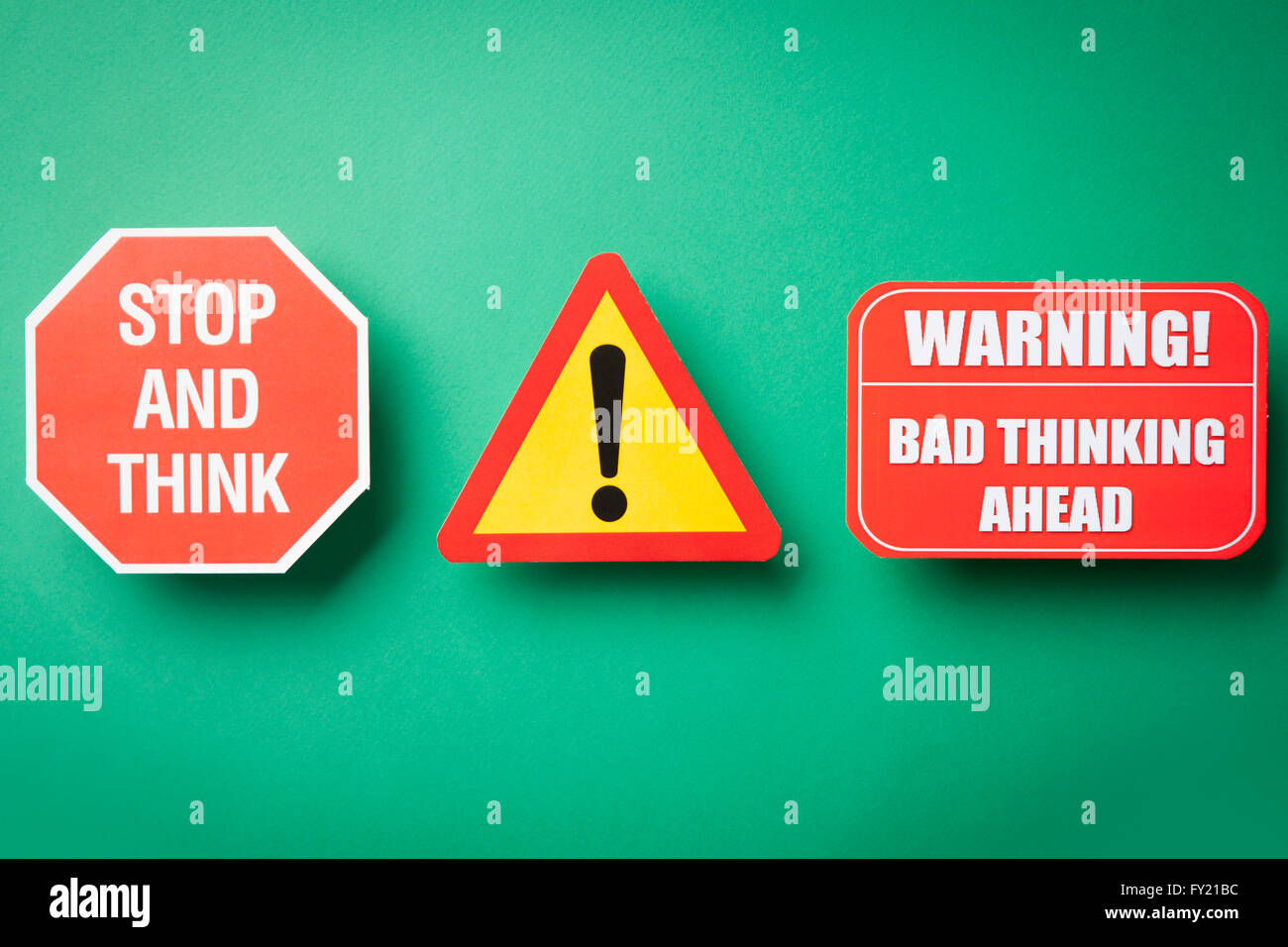 Traffic signs on green background Stock Photo - Alamy