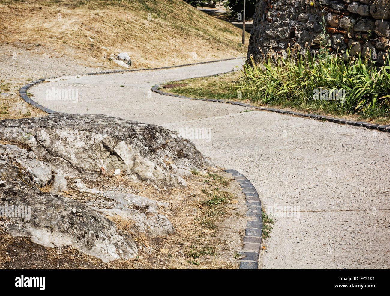 Winding path to the park. Outdoor scene. Twists on the road Stock Photo ...