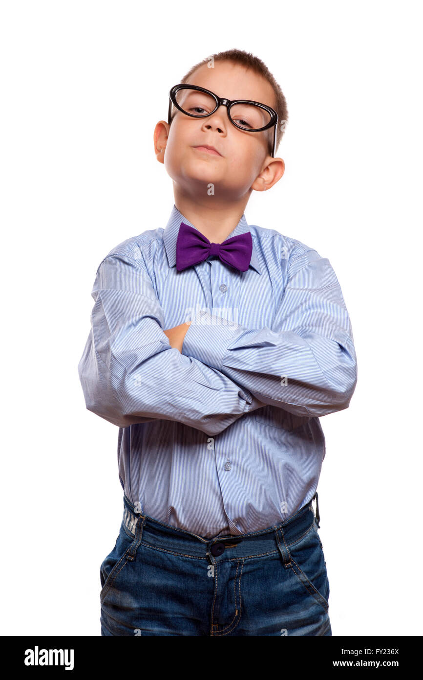 Portrait of a surprised little boy in spectacles and suit. Isolated ...