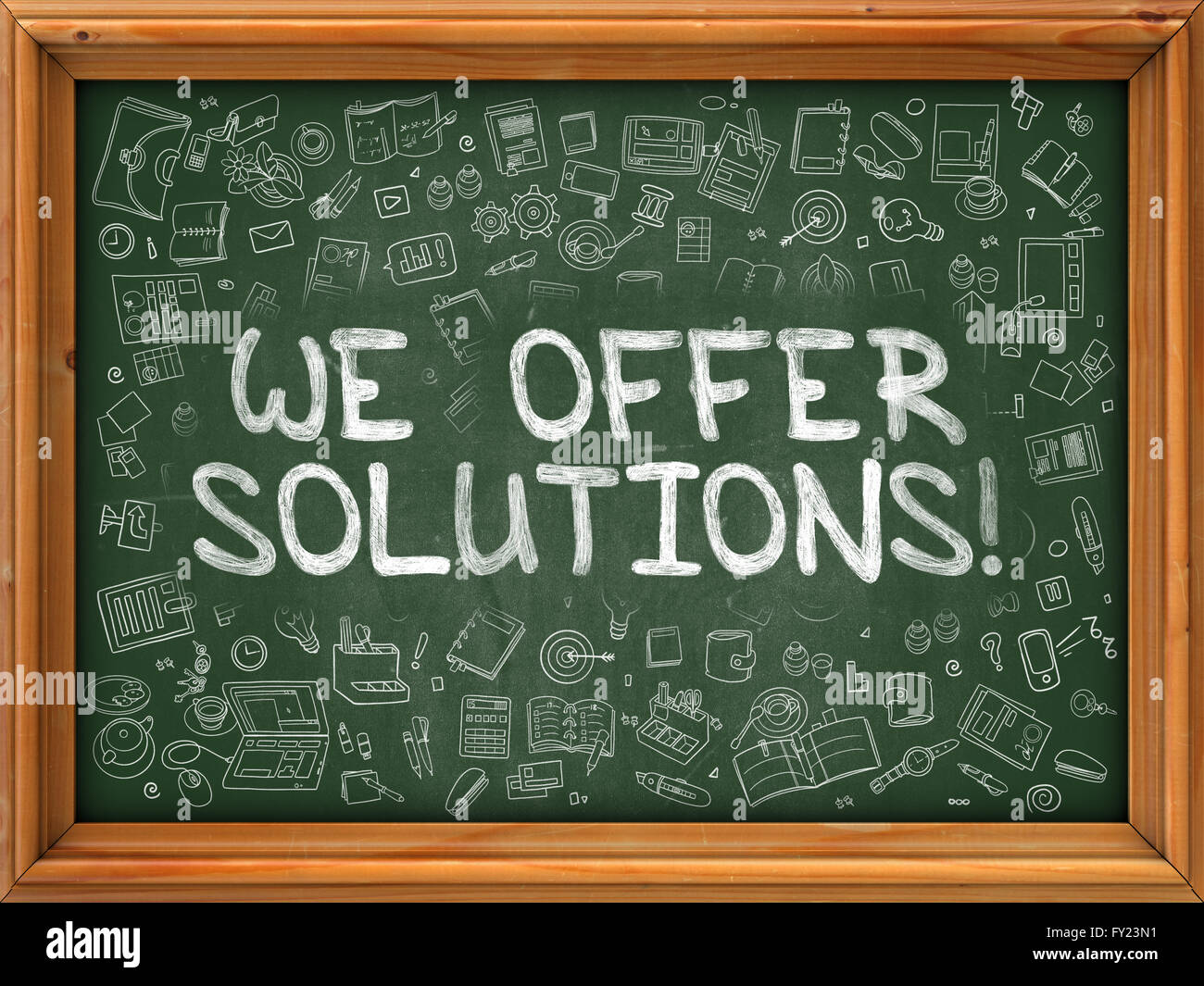 Hand Drawn We Offer Solutions on Green Chalkboard Stock Photo - Alamy
