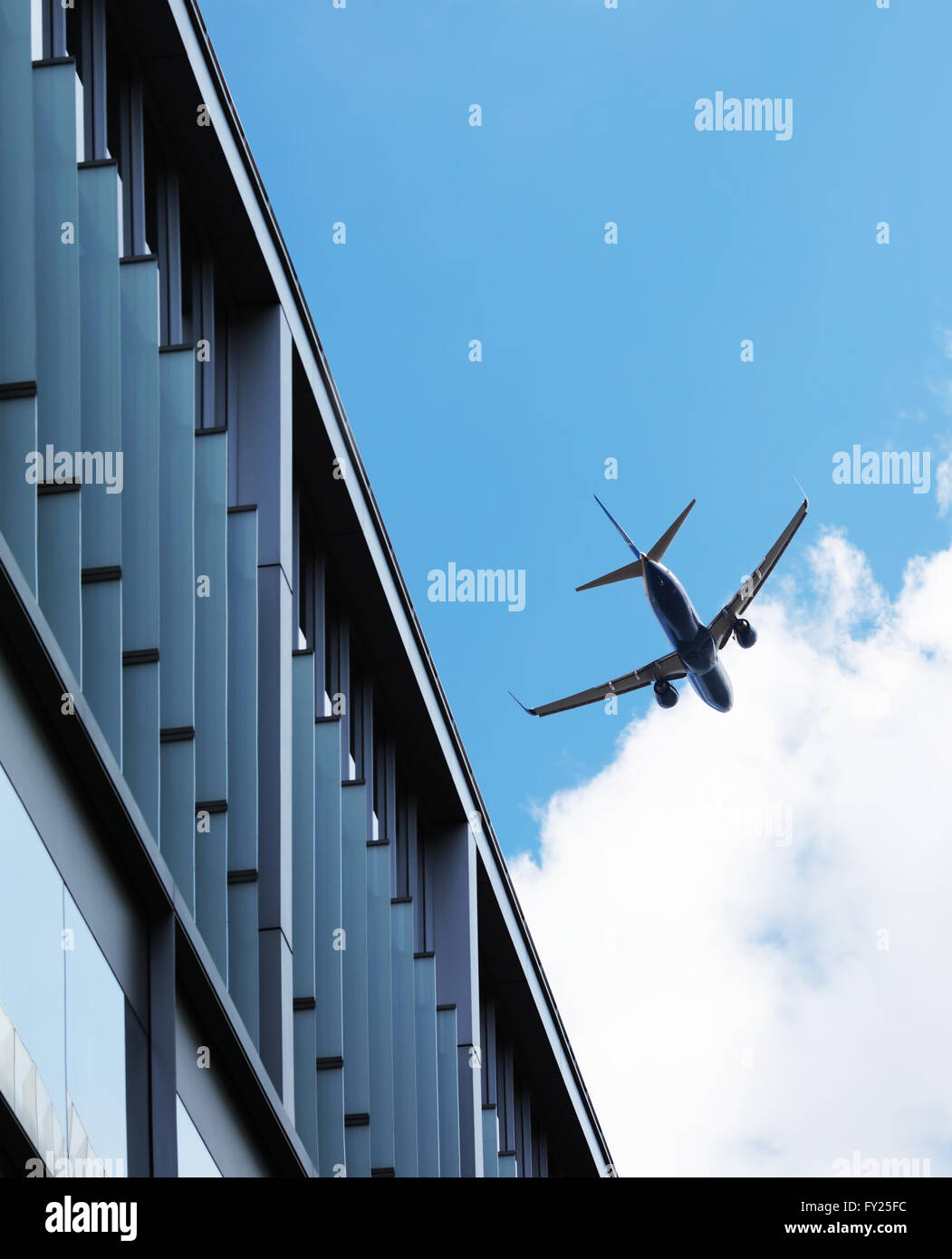 Plane Over Building High Resolution Stock Photography and Images - Alamy