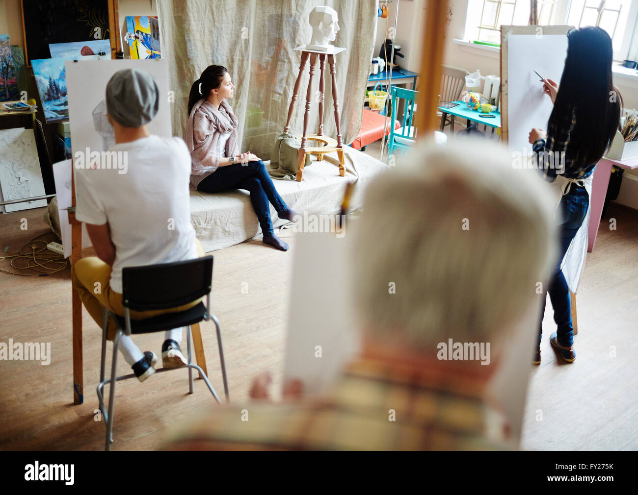 Drawing in group Stock Photo - Alamy