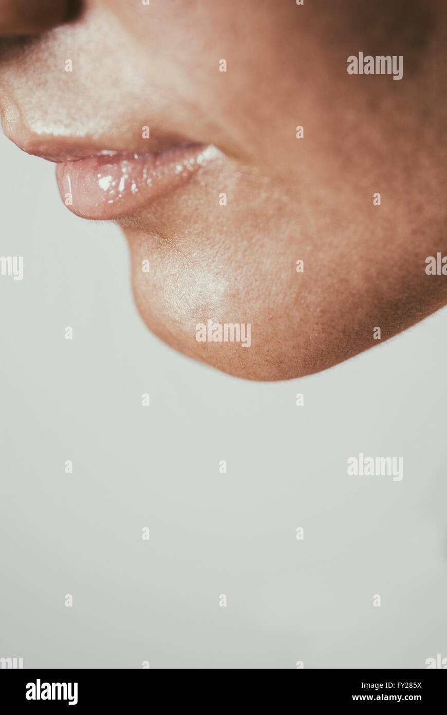 Close up of a young woman's chin Stock Photo - Alamy