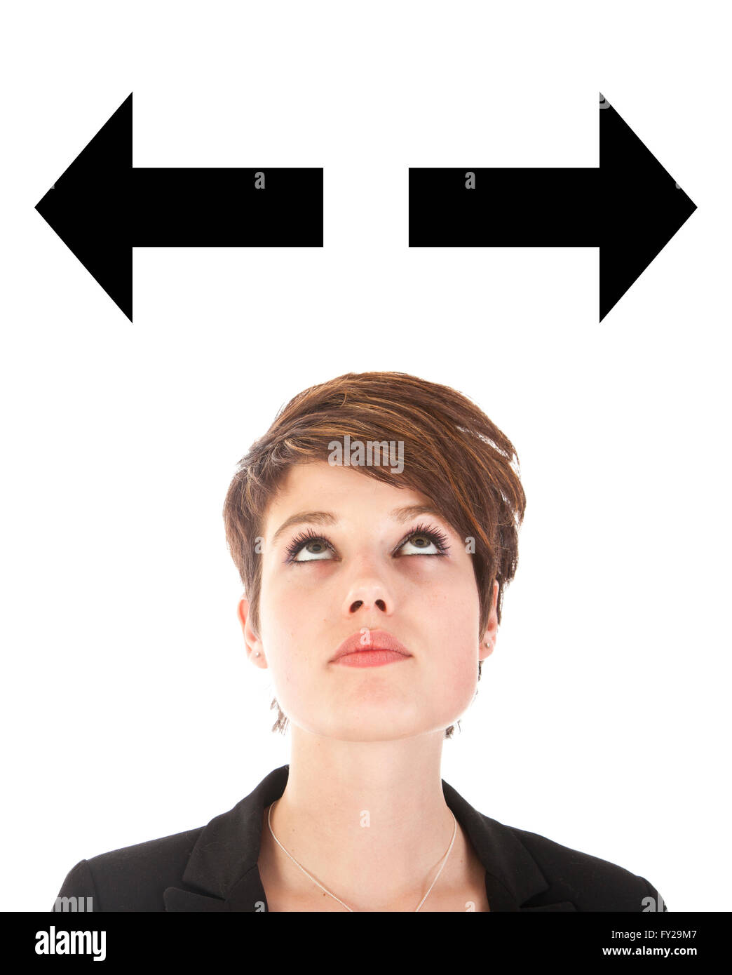 Young woman making a choice with arrows isolated on white background ...