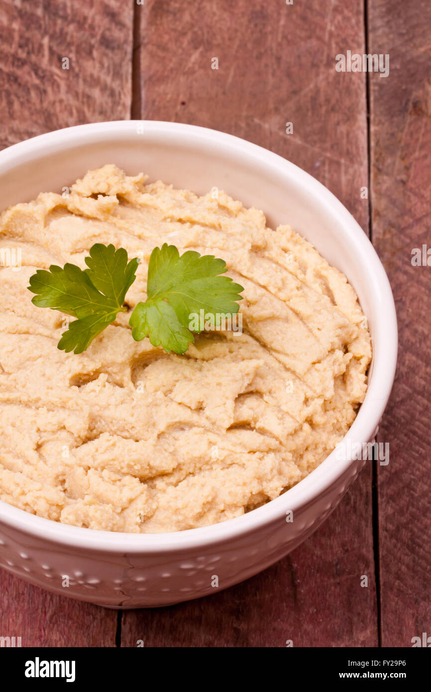 a bowl of hummus Stock Photo - Alamy
