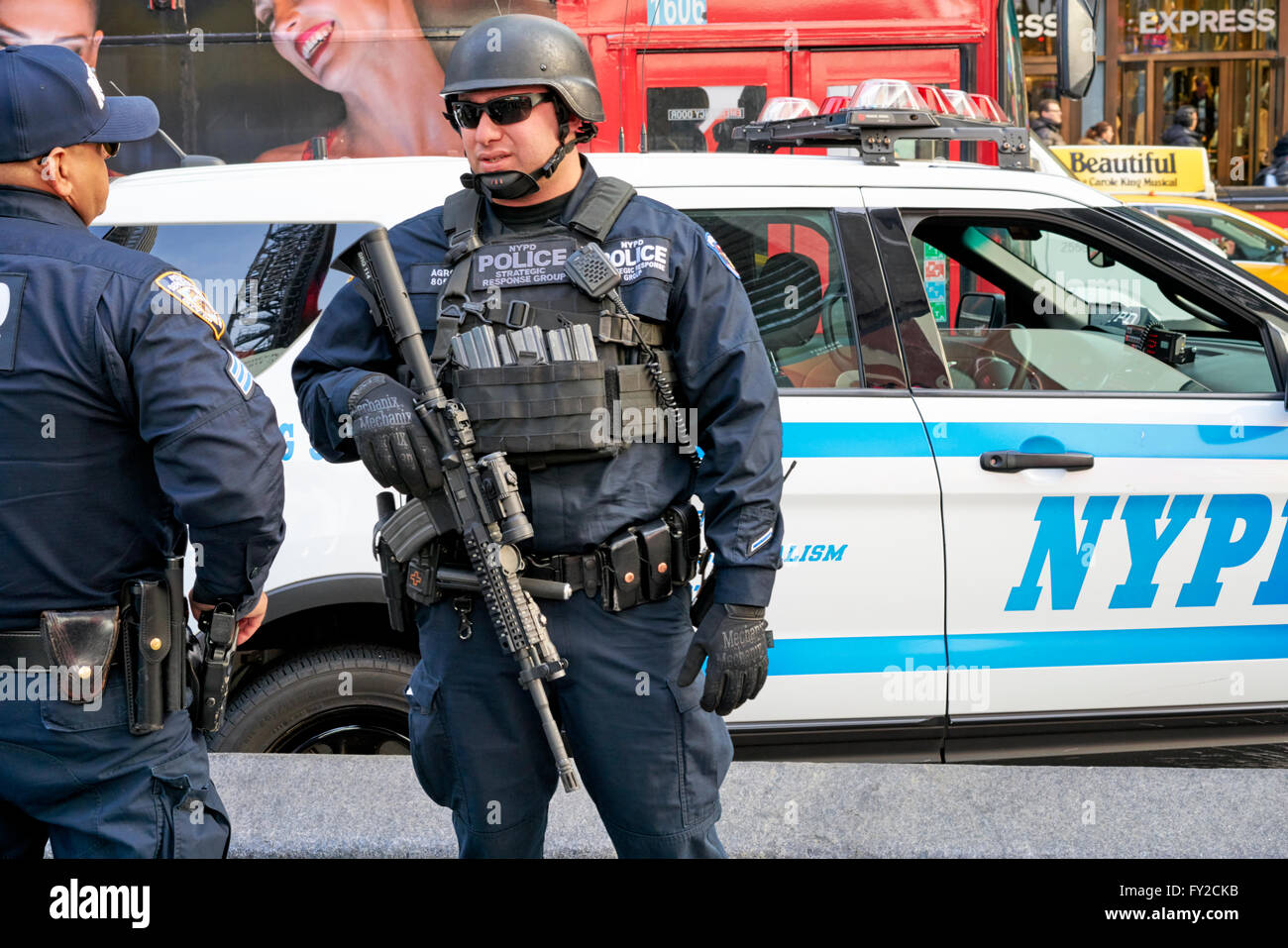 Armed police public hi-res stock photography and images - Alamy