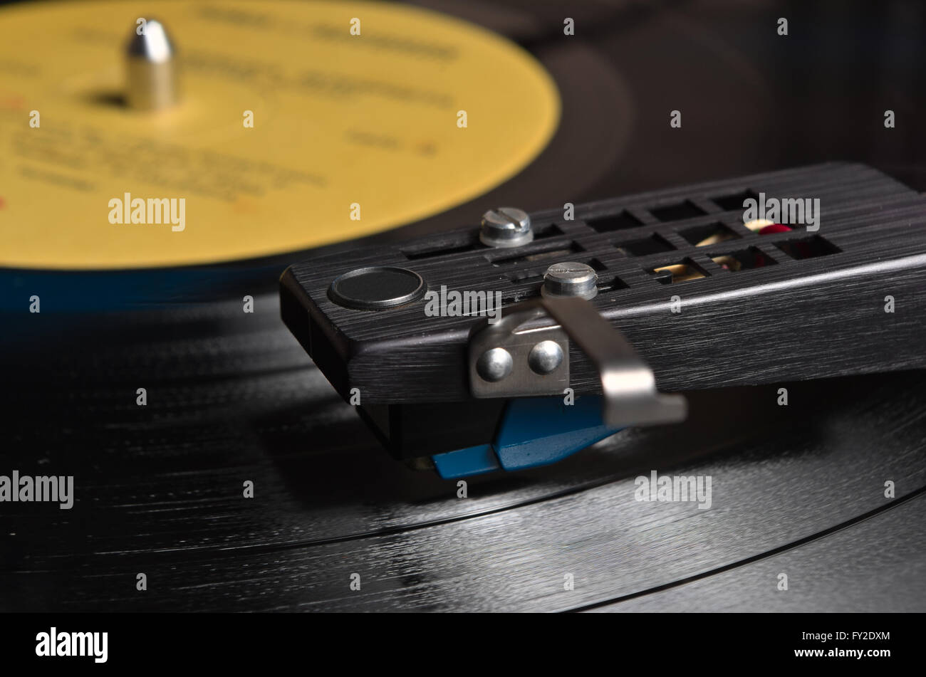 Vinyl record playing on a turntable. Music, dance and vintage theme ...