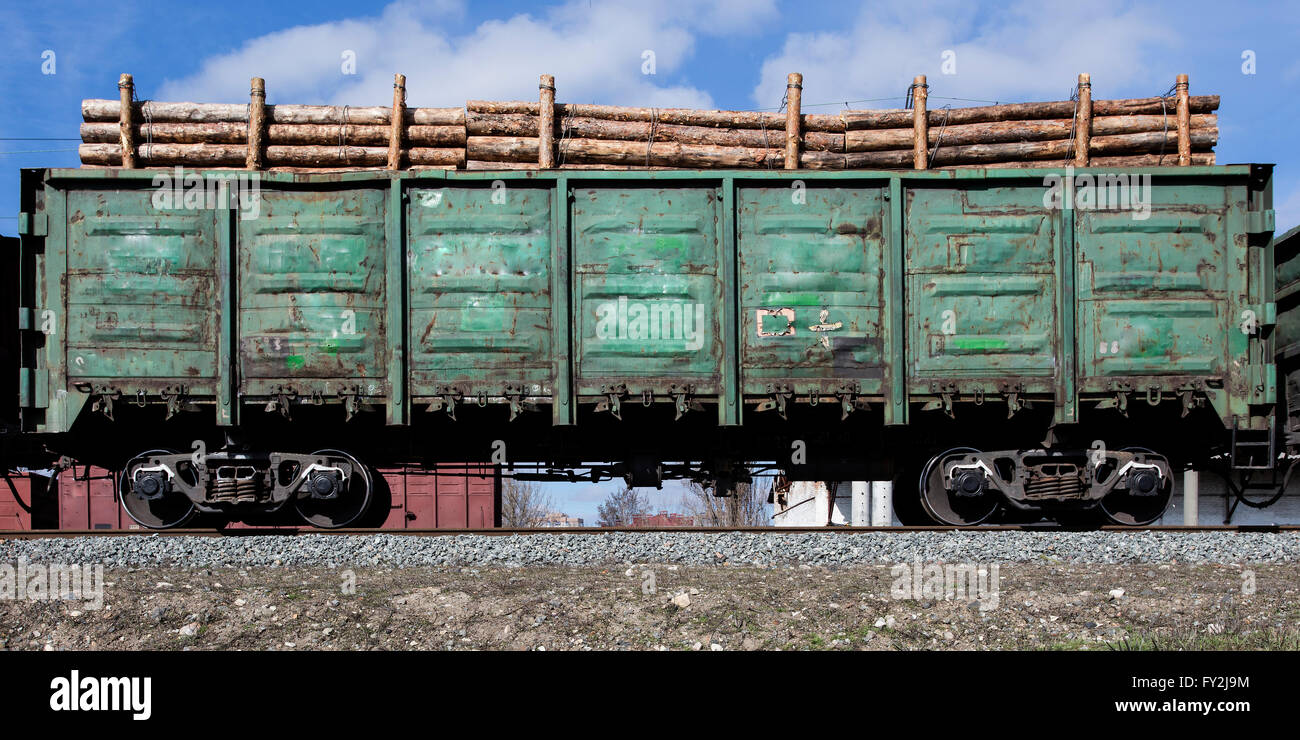 railway freight wagon, loaded with wood Stock Photo - Alamy
