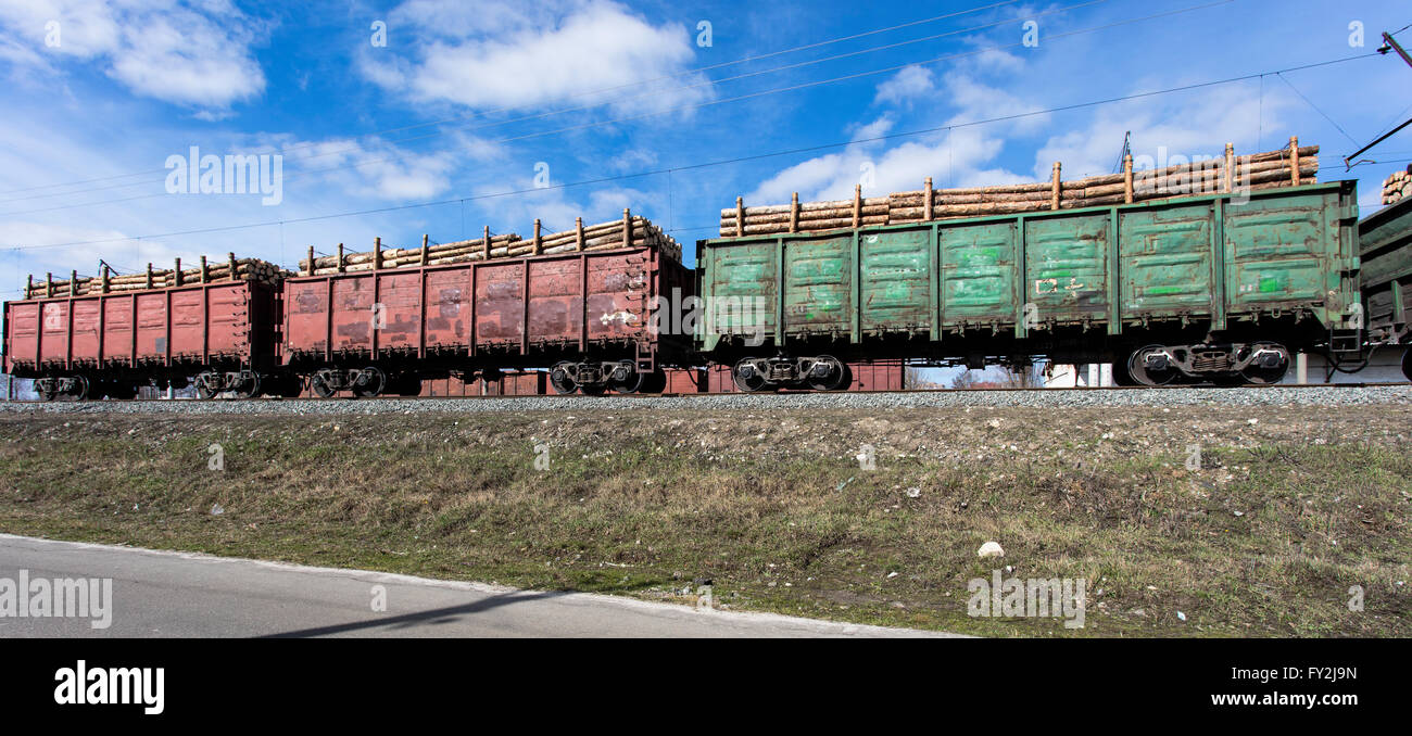 railway freight wagon, loaded with wood Stock Photo - Alamy