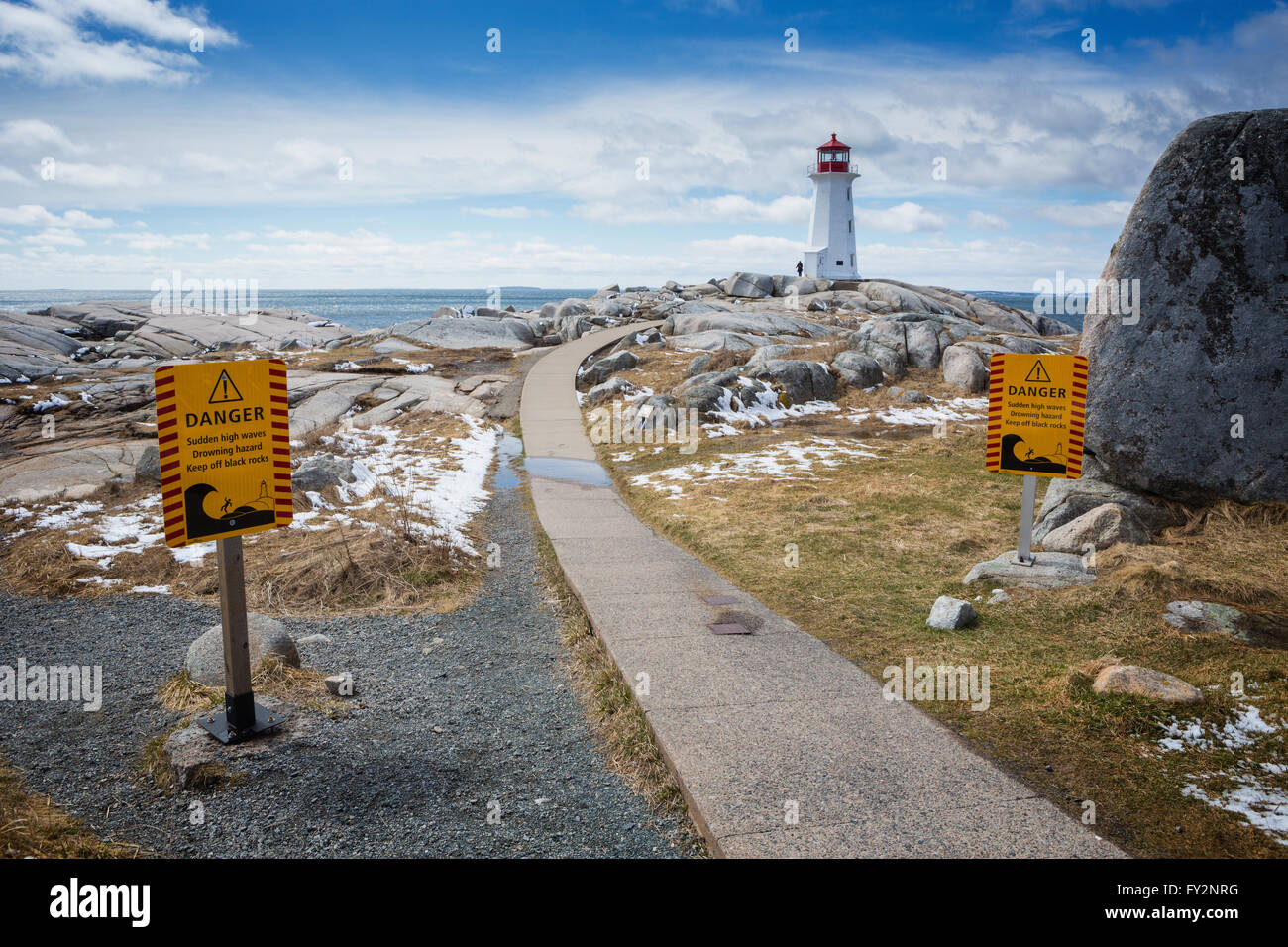 Peggy's Cove Lighthouse with warning signs Stock Photo - Alamy