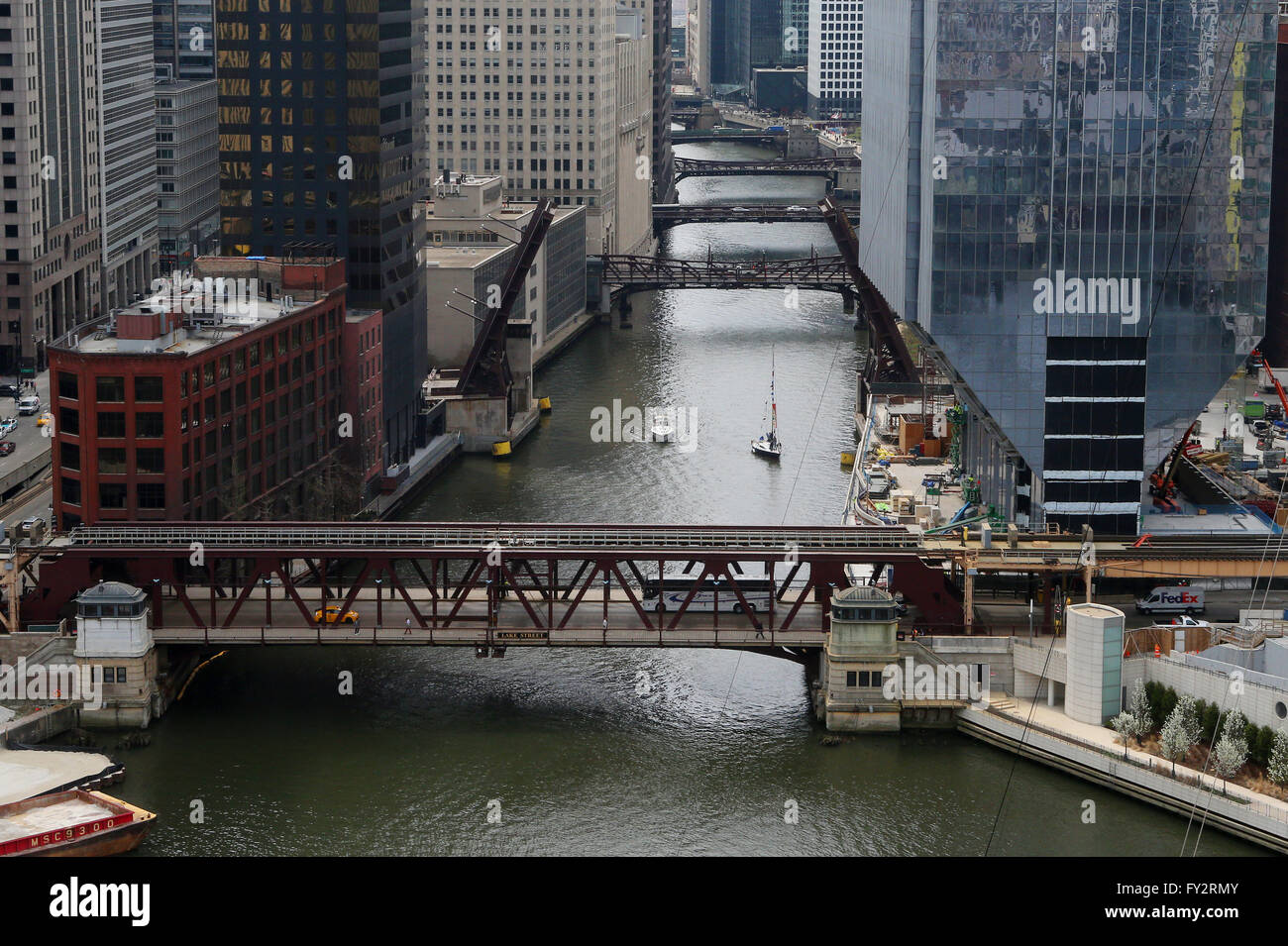 Sailboats make their way up the Chicago River as the Randolph Street ...