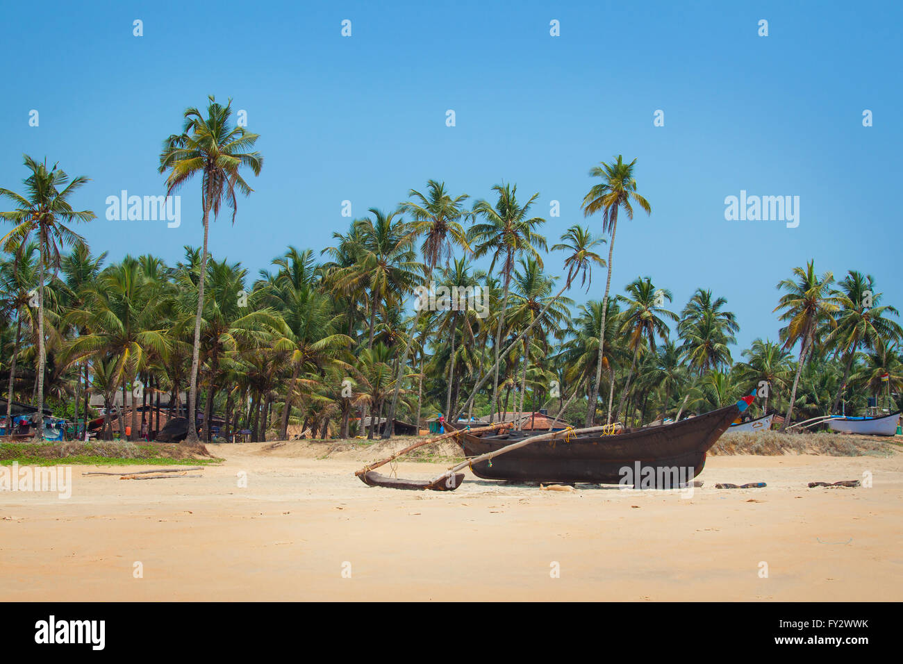 Kolva, India - April 20, 2016: Goan beach panorama with sand, fisherman ...
