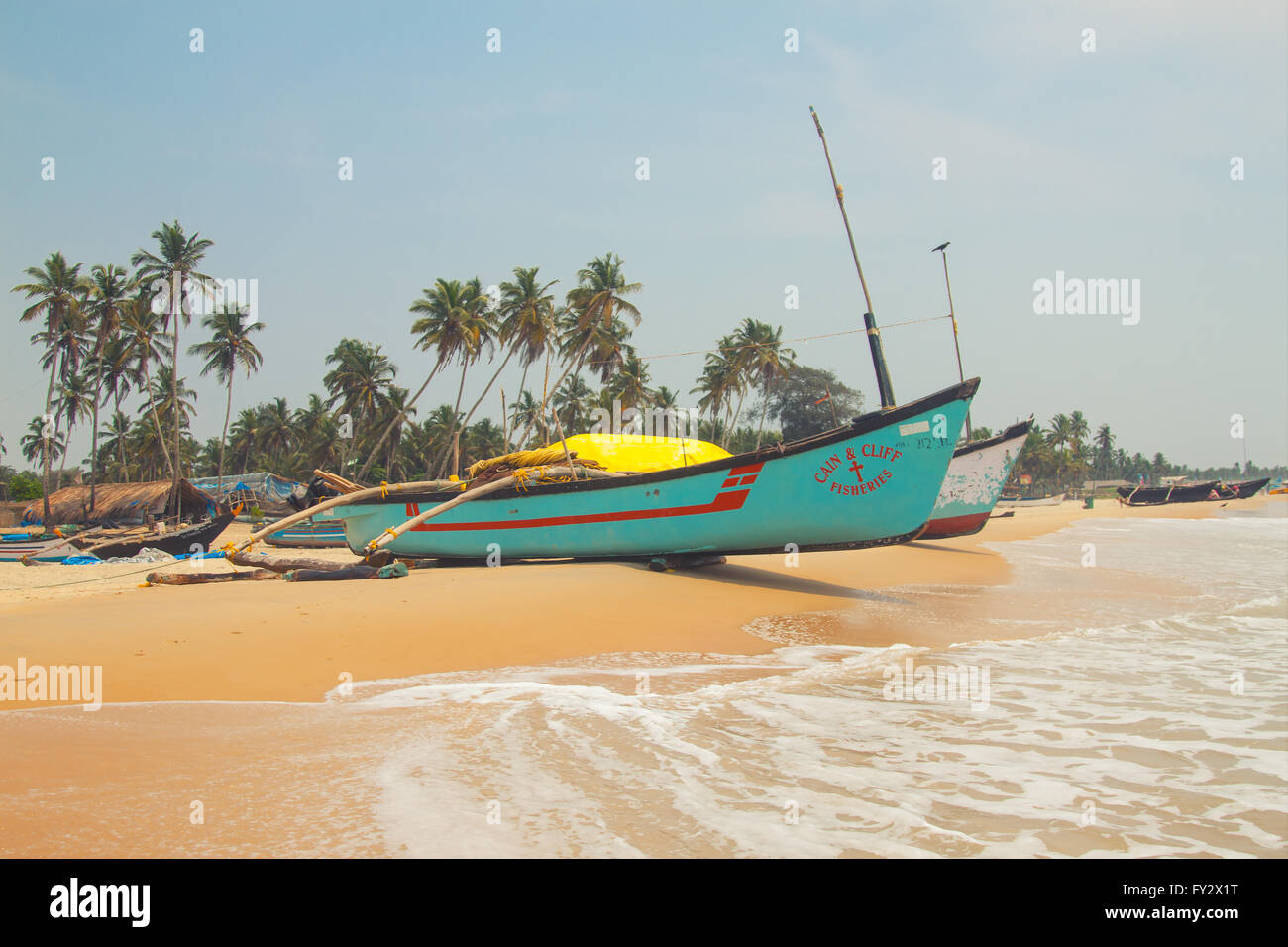 Kolva, India - April 20, 2016: Goan beach panorama with sand, fisherman ...