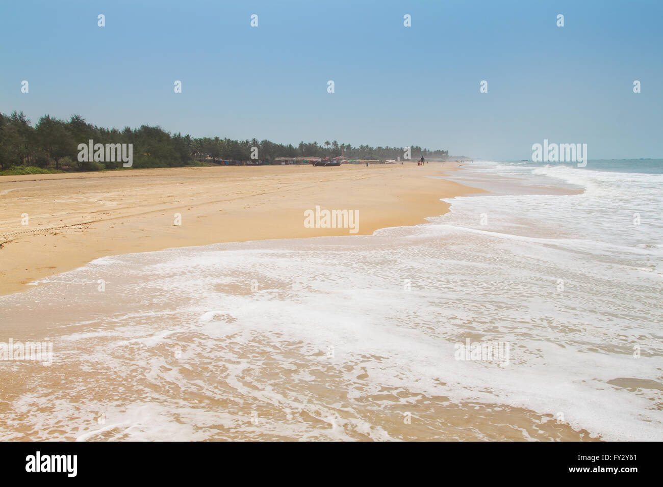 Kolva, India - April 20, 2016: Goan beach panorama with sea, fisherman ...