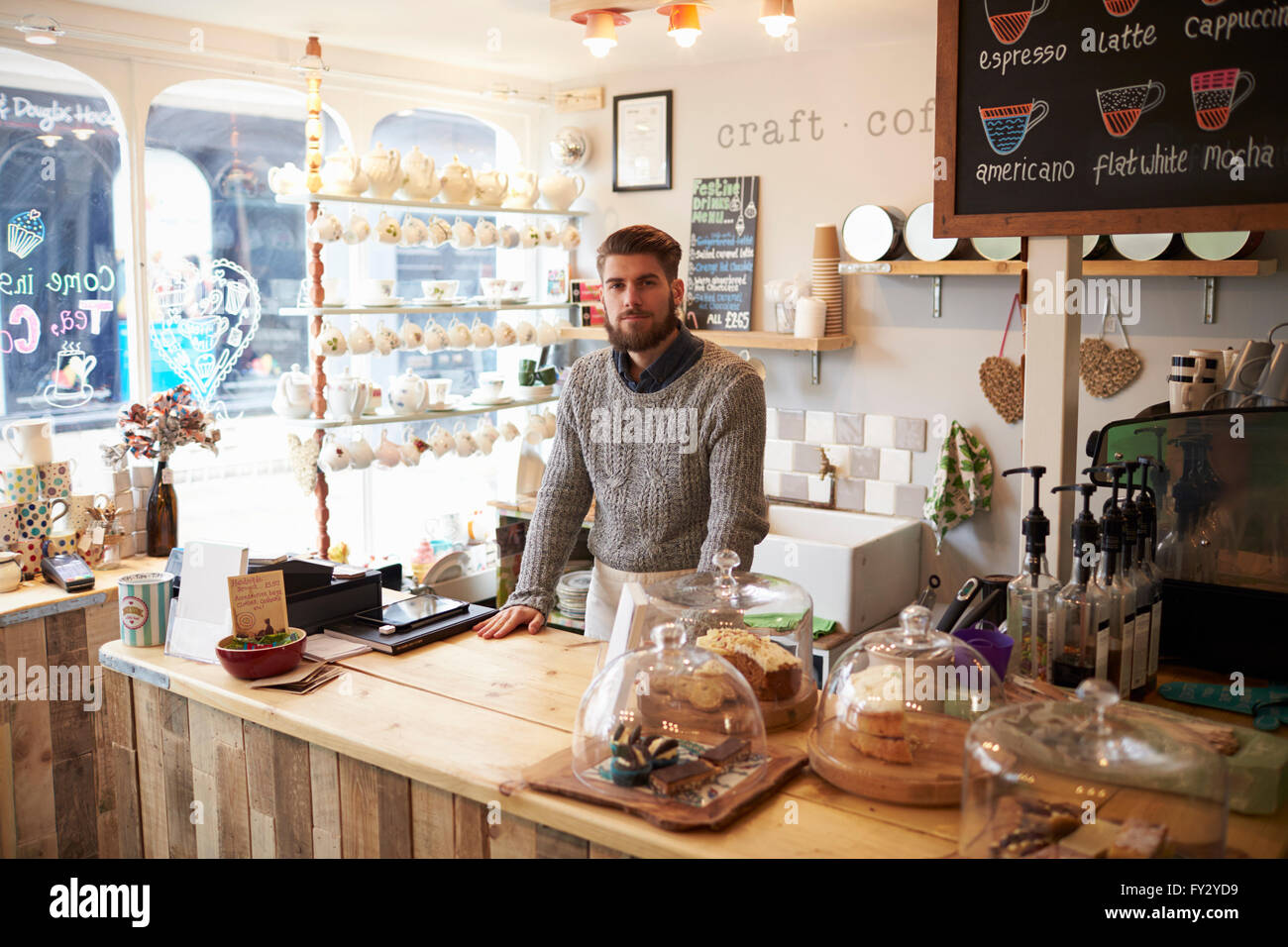 Young man running small business hi-res stock photography and images ...