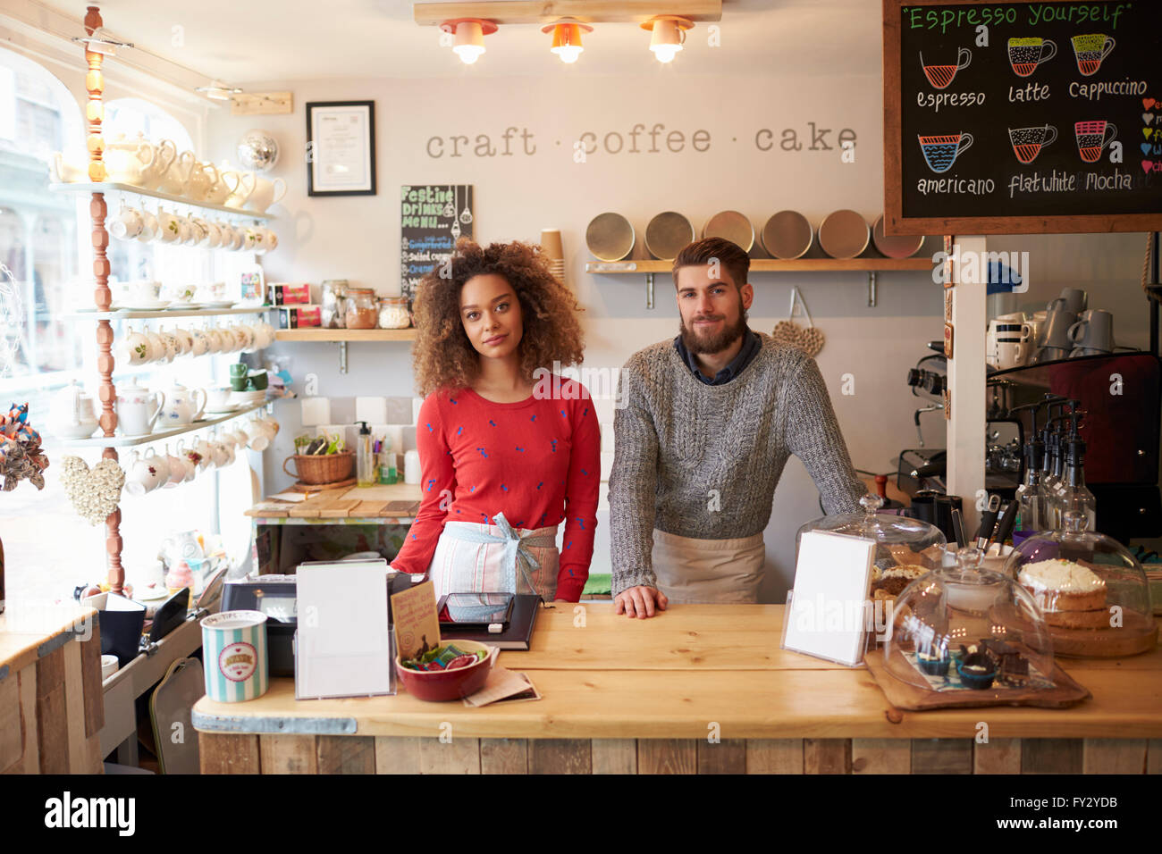 Portrait Of Young Couple Running Coffee Shop Stock Photo - Alamy