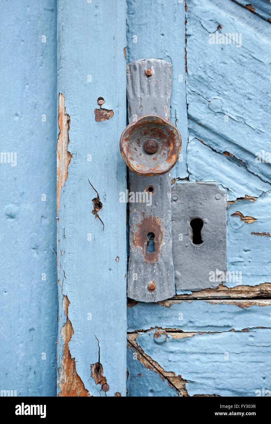 detail of a old rundown blue wooden door with blue flaking paint Stock ...